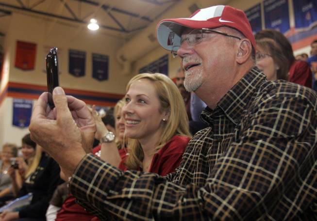 Signing Day at Bishop Gorman - Jim Chaisson Sr. takes a picture of his ...
