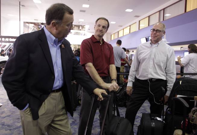 Rebels at the Airport - UNLV Athletic Director Jim Livengood, left ...