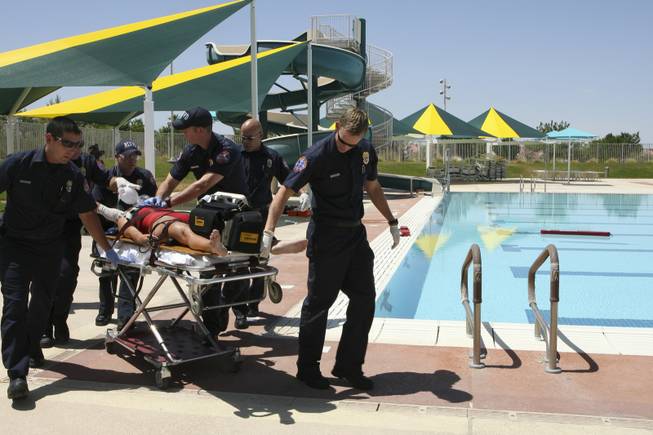 Mock drowning exercise - Paramedics and firefighters rush Courtney ...