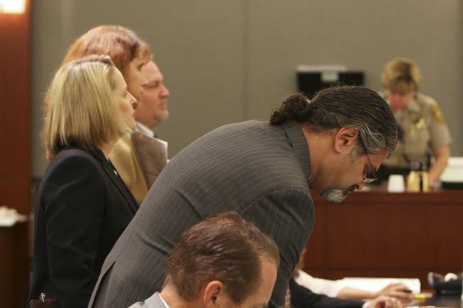Ericka McElroy - Deputy public defender Joe Abood, right, waits for a ...