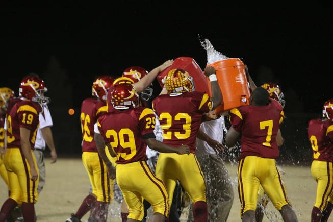 Del Sol vs. Coronado - Members of the Del Sol football team douses ...
