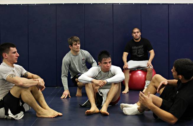 Torres - Jay Viola, from left, A.J. Agazarm, WEC bantamweight fighter ...