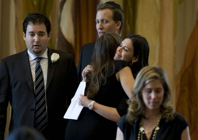 Barbara Greenspun Funeral Services - Amy Arenson, center right, gives a ...