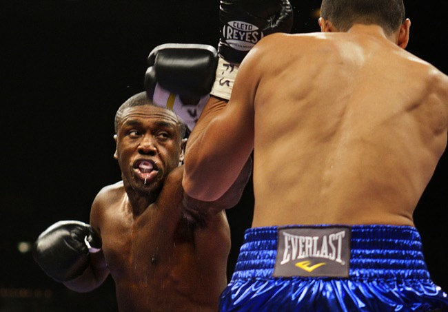 Juan Manuel Marquez stops Michael Katsidis, defends lightweight title ...