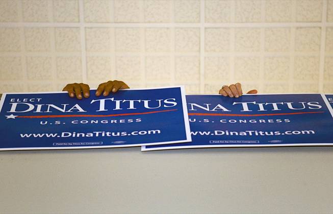 Titus Opens Campaign Headquarters - Supporters hold signs from a second ...