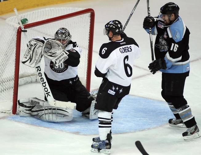 Wranglers vs. Aces Game2 - Wranglers goaltender Joe Fallon deflects an ...