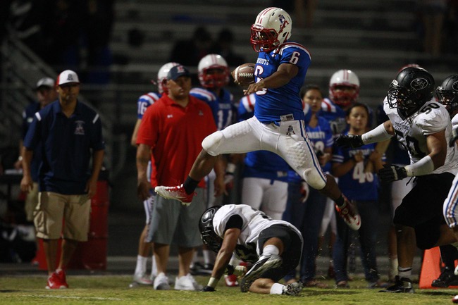 UNLV commit Niko Kapeli has four touchdowns, leads Liberty to crucial ...