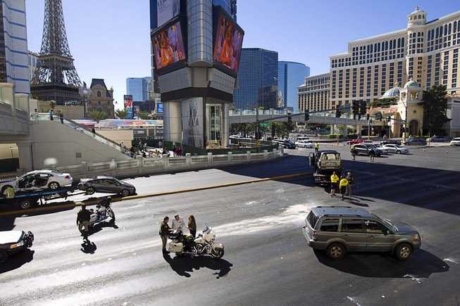 Six-Vehicle Accident on the Strip - An accident scene is cleared out as ...
