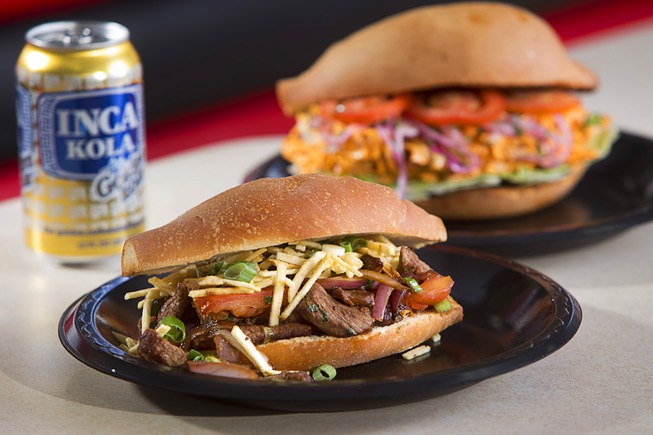 Pollo Inka Express - Pan Con Lomo, foreground, and an Inka Sandwich at ...