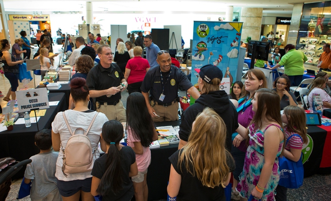 Back To School Fair 2016 - Families visit with police officers as they ...