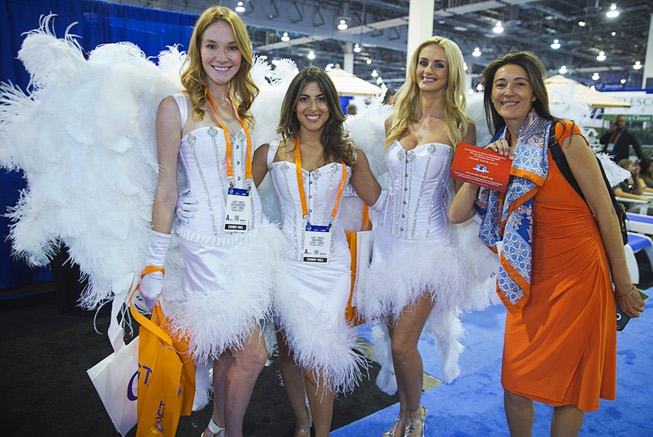 2016 Global Gaming Expo: Day 1 - Lucky Seven Angels pose with company ...