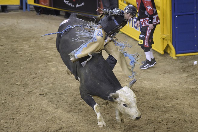 2016 Wrangler NFR Opening Night - Bull rider Scottie Knapp competes ...
