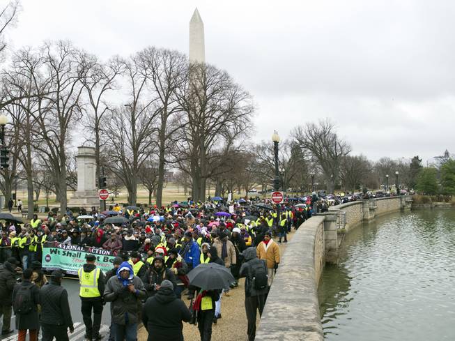 Marchers brave cold, rain for MLK march in DC - Las Vegas Sun News