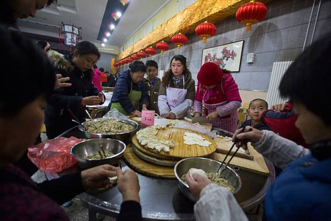 Chinese Lunar New Year feast begins with drums and dumplings - Las ...