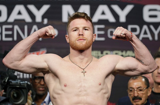 Alvarez and Chavez Jr. Weigh-in - Canelo Alvarez poses for ...