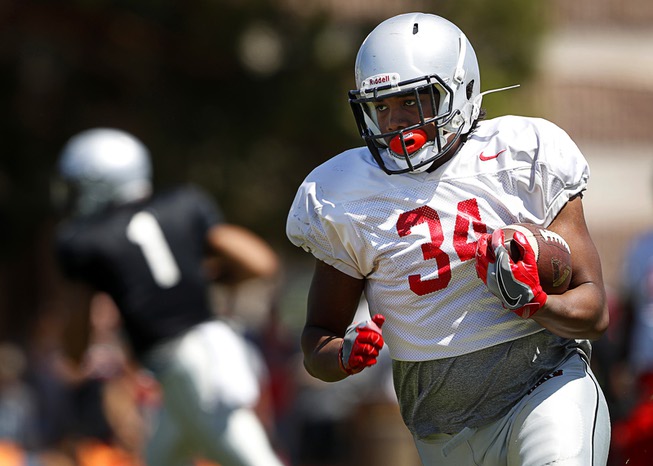 2018 Rebels Spring Showcase - Running back Rashad Walker warms up for a ...