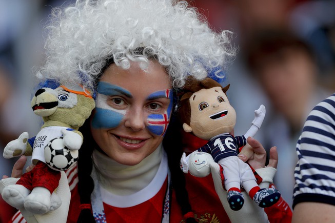 2018 Soccer World Cup Fans - A soccer fan with her face painted with ...