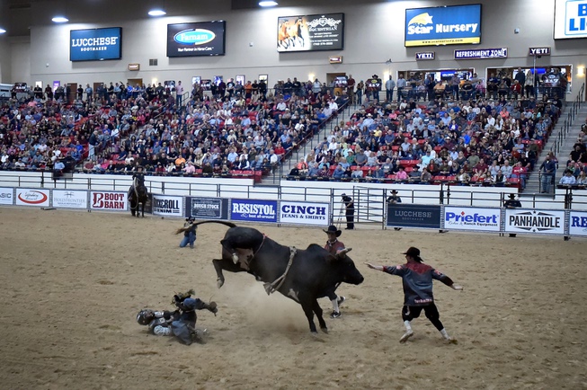 TUFF HEDEMAN BULL RIDING Tour - Laramie Craigen of Texas falls from a ...