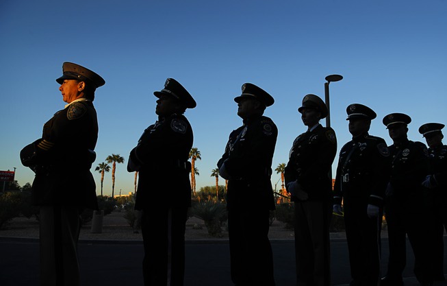 1 October Sunrise Remembrance Ceremony - Members of a law enforcement ...