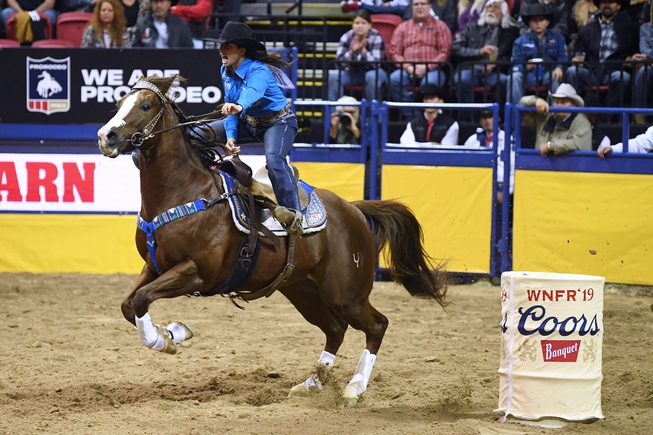 National Finals Rodeo First Round - Barrel racer Jennifer Sharp heads ...