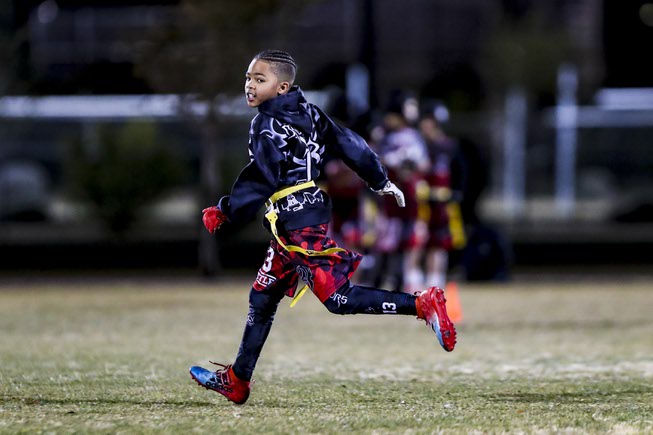 Trenton Mitchell - Nine-year-old Trenton Mitchell plays flag football ...