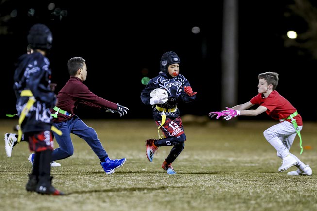 Trenton Mitchell - Nine-year-old Trenton Mitchell plays flag football ...