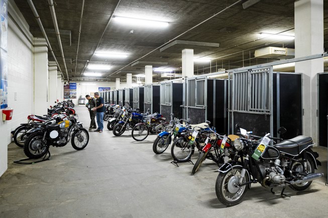 South Point Arena - Motorcycles are staged near horse stables during ...