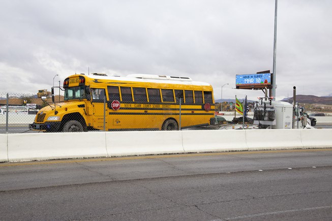 Overturned School Bus - A school bus that had been overturned is towed ...