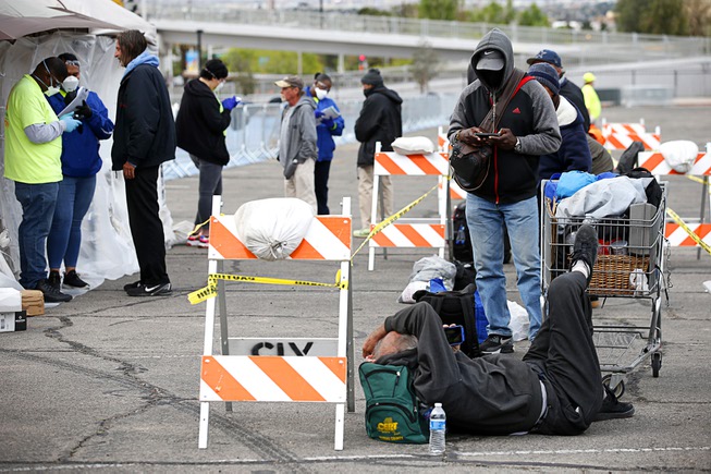 City Opens Temporary Homeless Shelter at Cashman - People wait in line ...
