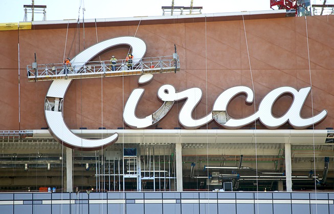 Circa Sign Installation - Workers complete the installation of an ...
