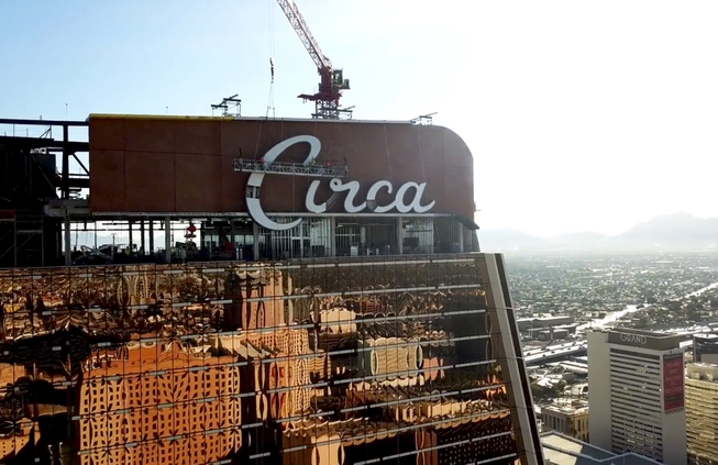 Circa Sign Installation - Workers complete the installation of an ...