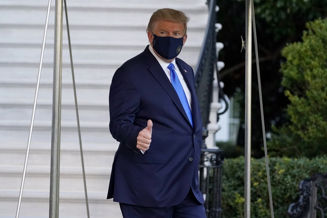 Trump Heads to Hospital - President Donald Trump gives a thumbs-up as ...