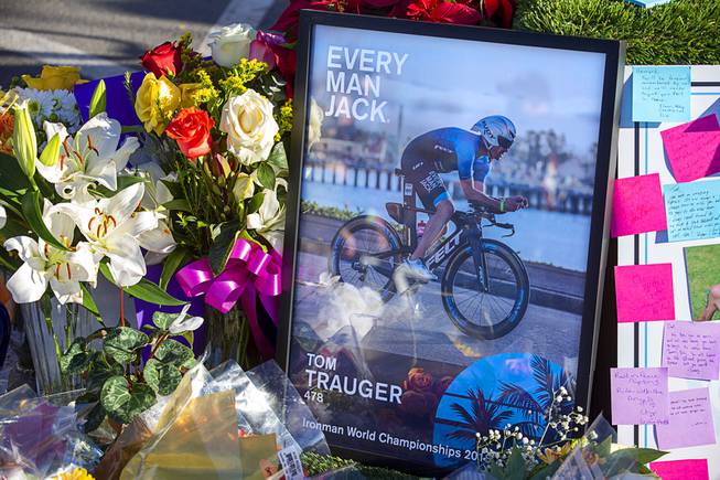 Cyclists Honored at Vigil - A photo of Tom Trauger is shown in a Ghost ...