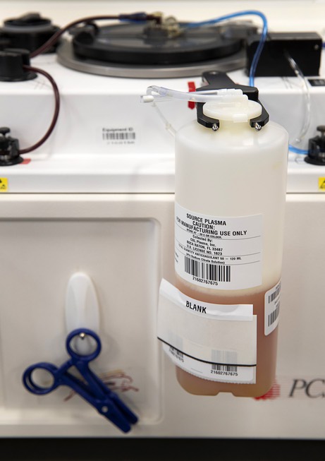 Plasma Donations - Plasma collects in a bottle at CSL Plasma, 3220 S.