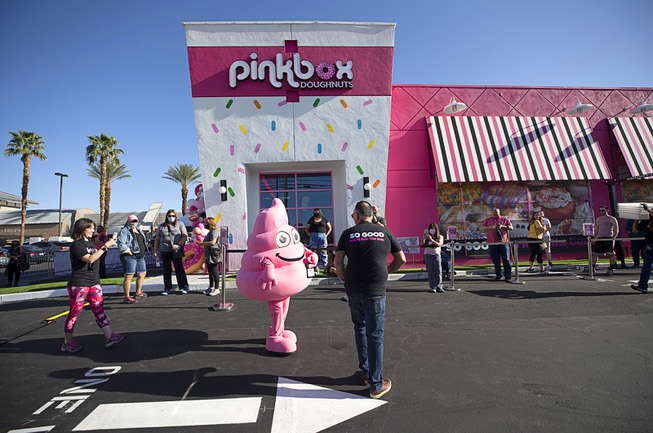 Pinkbox Opens Fourth Shop - Pinky, the Pinkbox Doughnuts mascot, greets ...