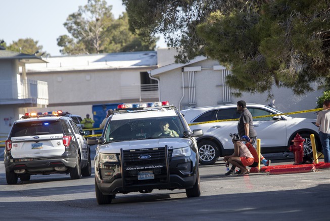 Hotel Homicide - Metro police are shown at the Motel 6 hotel on ... -