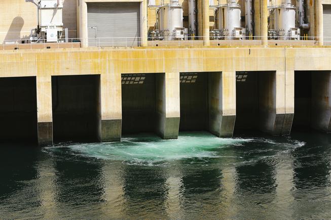 Hoover Dam Tour - Excess water from hydraulic turbine generators spills ...