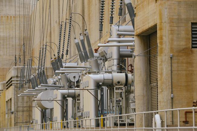 Hoover Dam Tour - Transformers are seen at the base at Hoover Dam ...