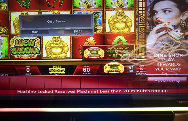 LuckLock Machine Reserve - A Lucky Buddha slot machine is shown in a ...