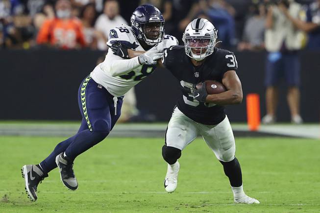 Photograph : 0814_sun_RaidersSeahawks3 - Las Vegas Sun News