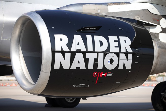 Allegiant's Raiders Plane Unveiled at McCarran - A jet engine is shown ...