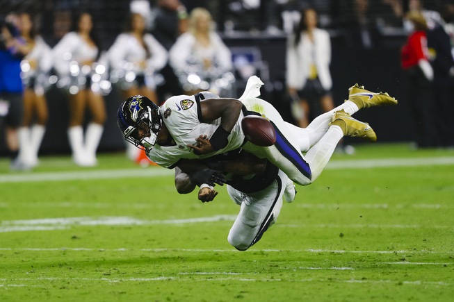 Raiders Beat Ravens, 33-27, in OT - Baltimore Ravens quarterback Lamar ...