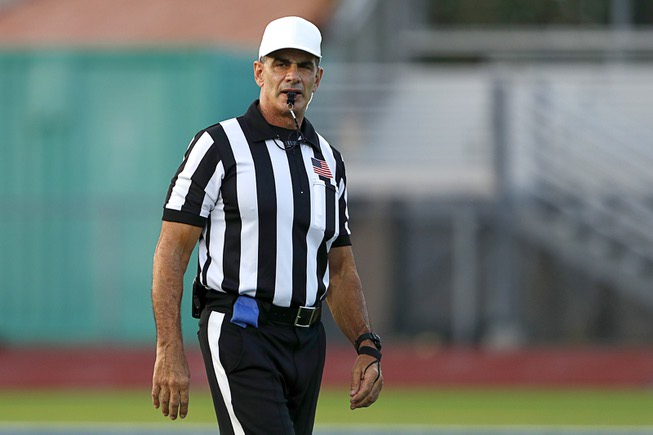 High School Sports Officials - Referee Joe Molinaro works the Henderson ...