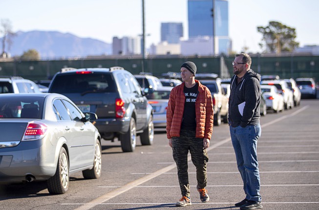 Just One Project - Cars are lined up during a Just One Project food ... -