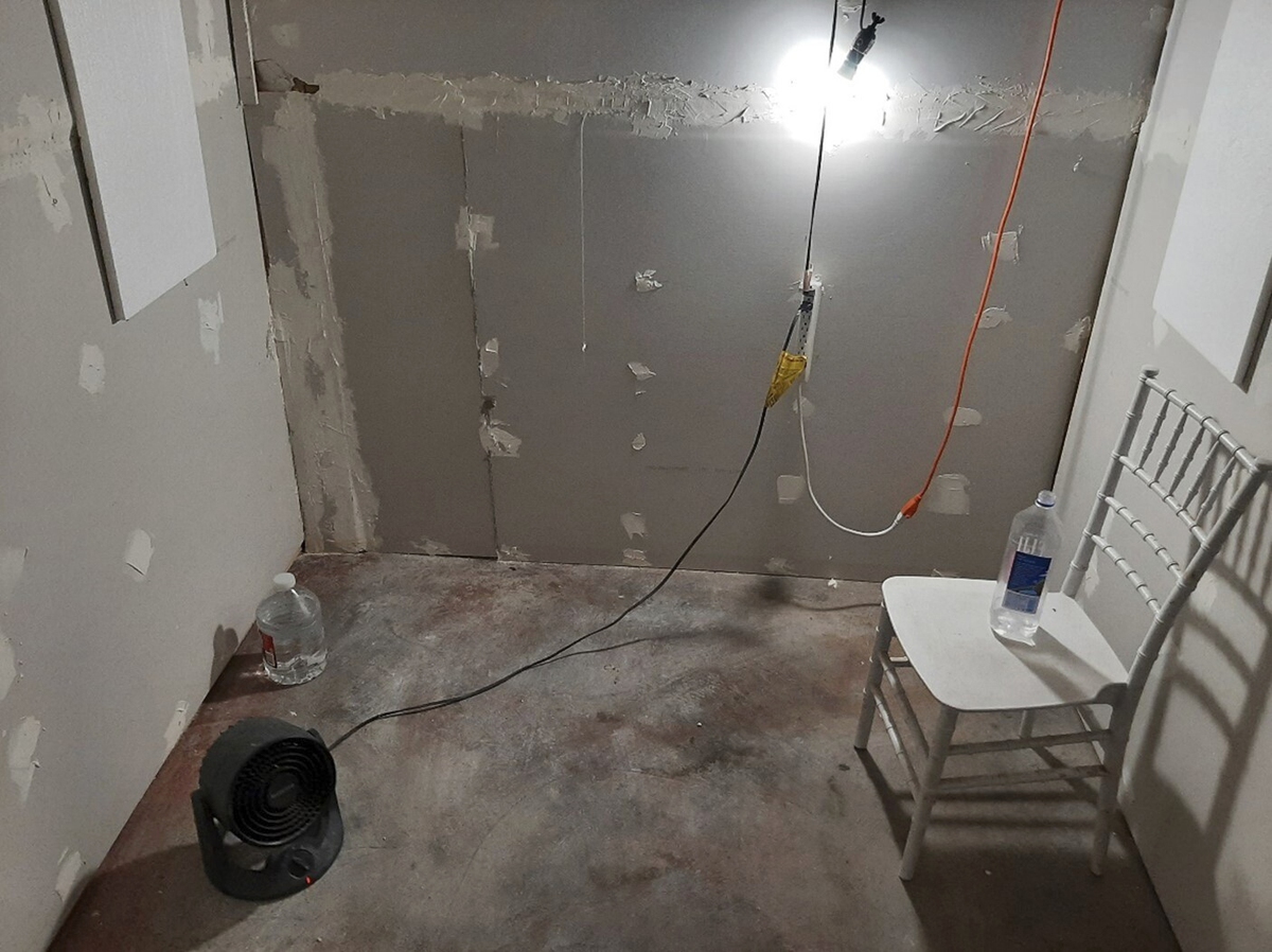 A man accused of locking a woman in a homemade cell had a handwritten ...