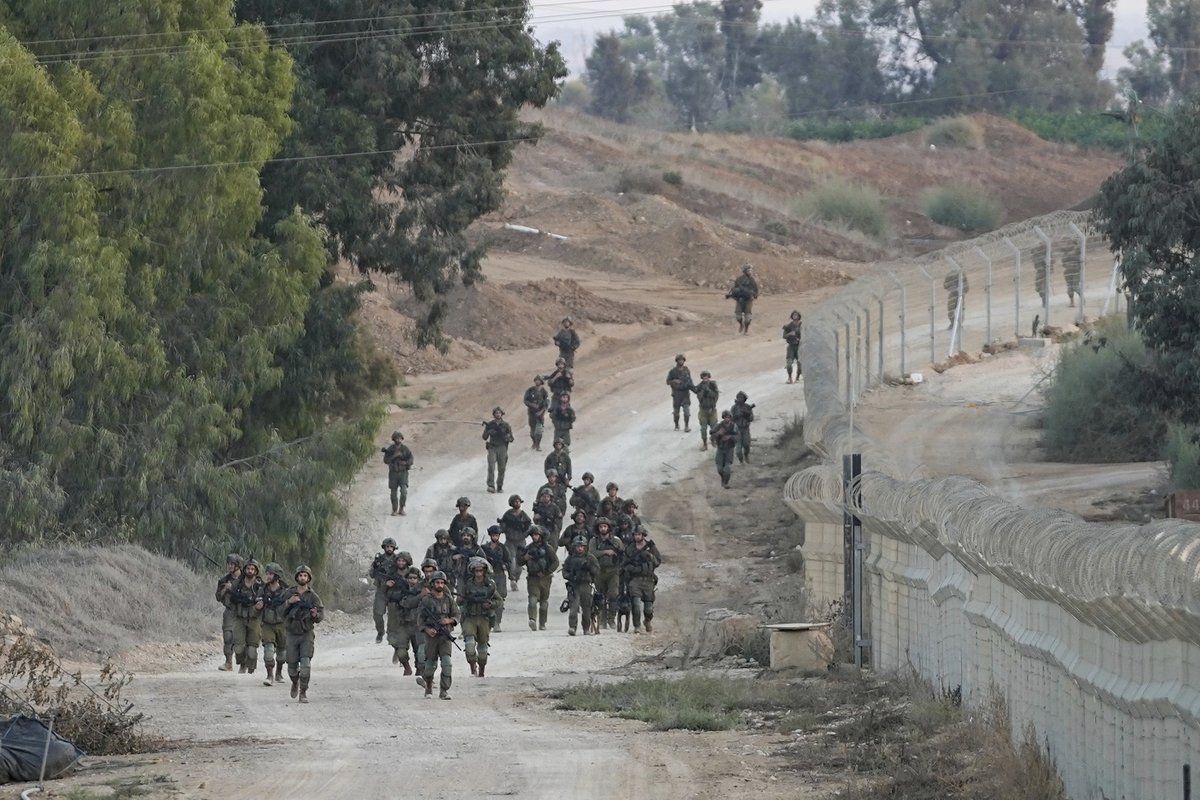After a hard fight to clear militants, Israeli soldiers find a scene of ...