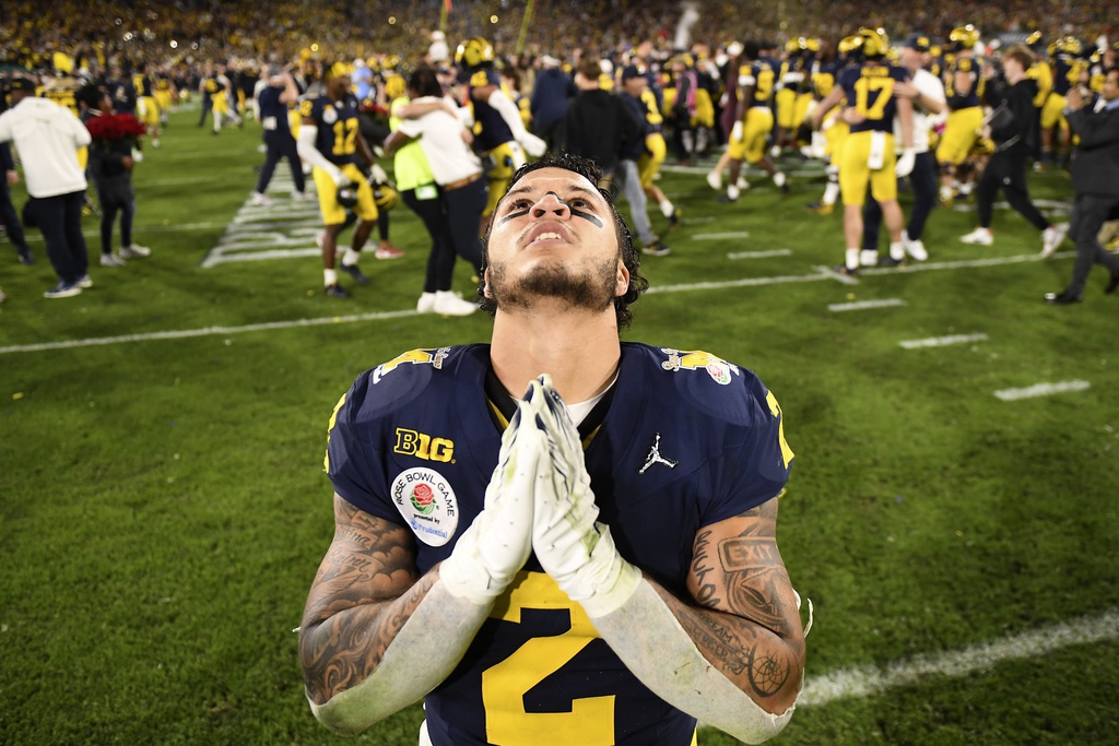 Michigan football fined millions, coach suspended 3 games in sign ...