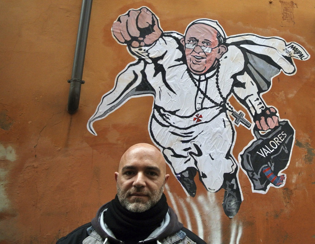 Street artist of 'Super Pope' fame gets new stamp of Vatican approval ...