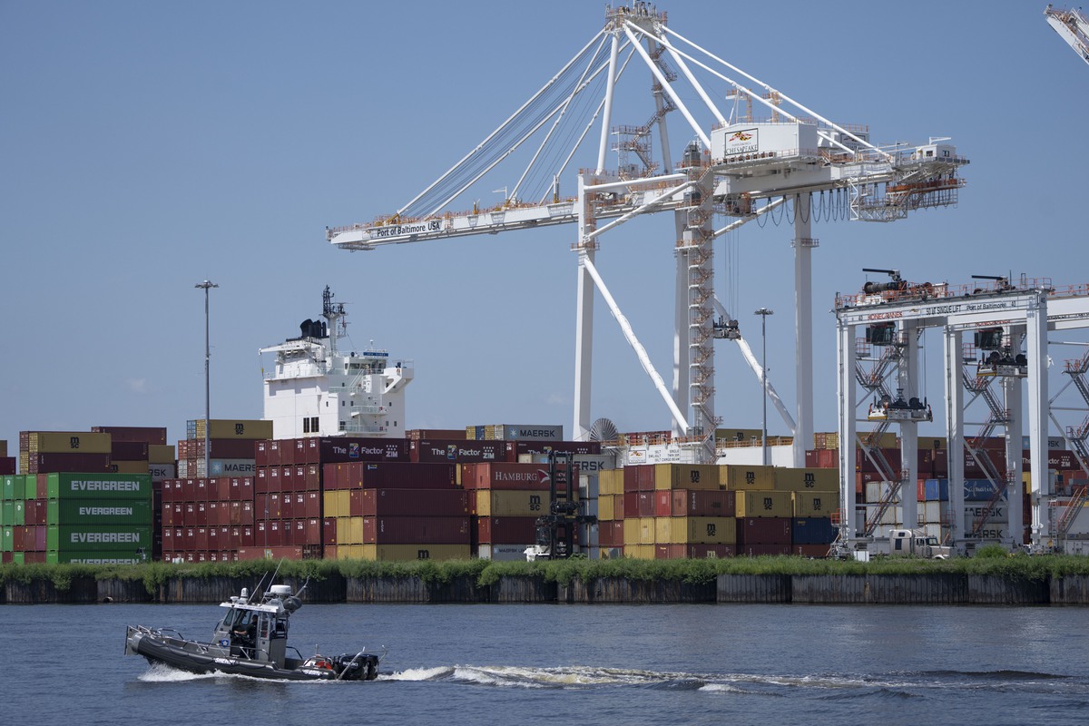 Baltimore's busy port fully reopens after bridge collapse, and a return ...