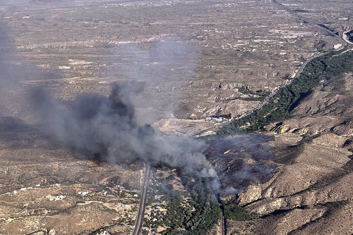 Key Phoenix-to-Las Vegas highway reopens after wildfire claims 6 homes ...